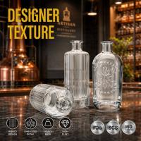 China Vertical Ribbed Floral Embossed Glass Liquor Bottle With Heavy Base For Spirits for sale