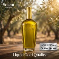 China Luxury Square Glass Bottle Shape Embossed With Gold Cap For Liquor Oil Decanter for sale