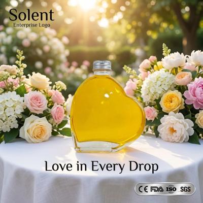 China Heart Shaped Leakproof Glass Bottle With Screw Cap High Clarity Lead Free Glass For Customizable Beverage Containers for sale