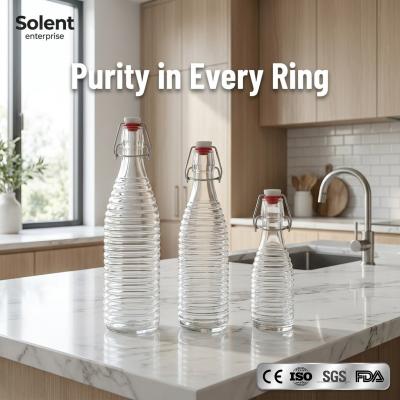 China Solent Ringed Glass Swing Top Bottle Airtight Beverage Container with Leakproof Seal Ringed Texture for sale