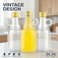China 40ml 60ml Clear Glass Bottle Juice With Ring Handle Made From Lead Free High Flint Glass for sale