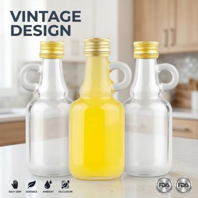 China 40ml 60ml Clear Glass Bottle Juice With Ring Handle Made From Lead Free High Flint Glass for sale