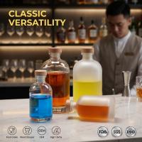 China Clear Frosted Glass Spirit Bottle With Wooden Cork Stopper Boston Round Design For Beverages for sale
