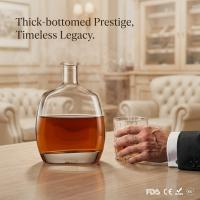 China 700ML Flat Oval Glass Liquor Bottle With Heavy Base Spirit Bottle Whiskey Decanter for sale