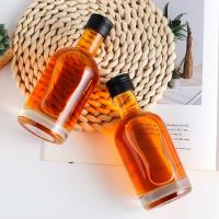 China Heavy Base 200ml Glass Flask Bottle With Black Aluminum Screw Cap For Whiskey Liquor for sale