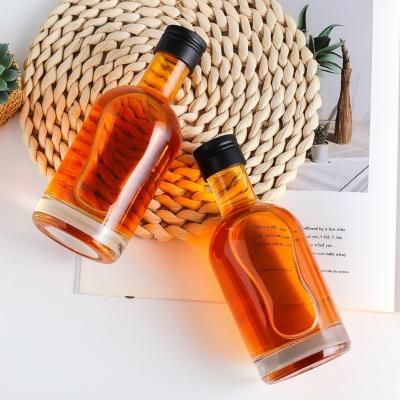 China Heavy Base 200ml Glass Flask Bottle With Black Aluminum Screw Cap For Whiskey Liquor for sale
