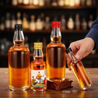 China 50ml 100ml Round Cylindrical Glass Bottle Spirits Sample Miniature Bottle With Colorful Cap for sale