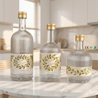 China 500ml Vertical Fluted Glass Bottle With Screw Cap For Spirits Liquor for sale
