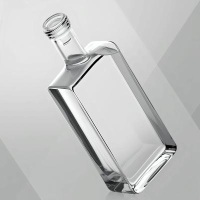 China Empty Flat Square Liquor Bottle With Cork Sealed Engraving Ready For Whisky Spirits for sale