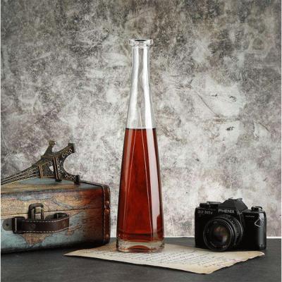 China 700ml Round Shape Clear Liquor Glass Bottle For Vodka Whisky Tequila Spirit Packaging for sale