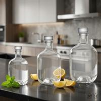 China Solent Luxury Concave Base High Flint Transparency Cylindrical Glass Liquor Bottle For Spirits for sale