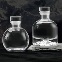 China Borosilicate Glass Liquor Bottle With Cork Stopper Round Shape For Spirits for sale
