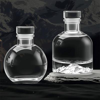 China Borosilicate Glass Liquor Bottle With Cork Stopper Round Shape For Spirits for sale