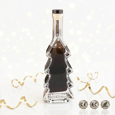 China 500ml Christmas Tree Shaped Glass Liquor Bottle With Cork Lid For Vodka Tequila Gin Brandy for sale
