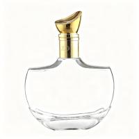 China 750ml Luxury Glass Bottle For Liquor With Gold Screw Cap Made Of Borosilicate Glass for sale