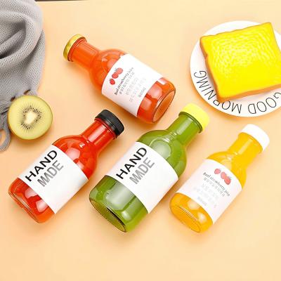 China Clear Beverage Glass Bottle 250ml 350ml 500ml Glass Juice Container With Aluminum Screw Cap for sale