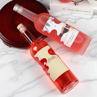 China Shape Design Glass Liquor Bottle With Cork Stopper Customizable Options For Beverage Container for sale