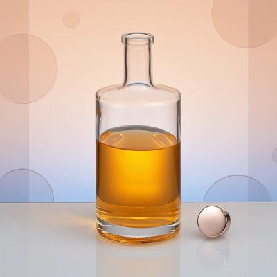 China Custom Super Flint Glass Liquor Bottle With Thick Bottom Round Shape For Spirits for sale