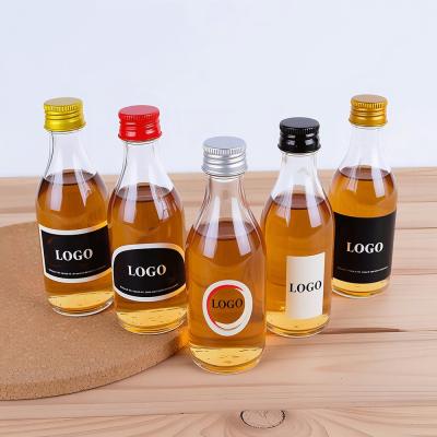 China 50ml Clear Liquor Glass Bottle With Screw Aluminum Cap For Spirits Whiskey for sale