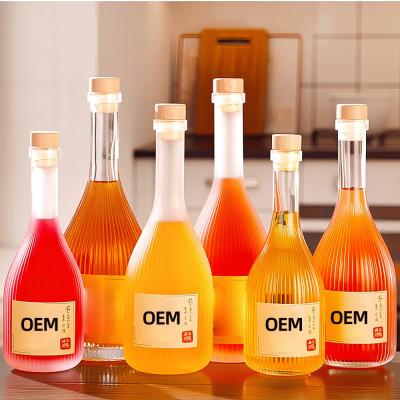 China Frosted Finish Glass Liquor Bottle with Cork Stopper 250ml 360ml 500ml for sale