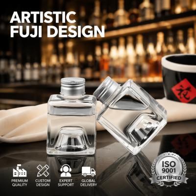 China Square Shape Mount Fuji Bottom Borosilicate Glass Bottle For Whiskey Spirits for sale