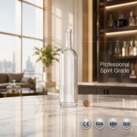 China Long Neck Clear Cylindrical Glass Spirit Bottle With Heavy Bottom Leakproof Sealing Solution For Whiskey Vodka for sale