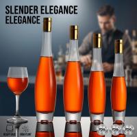 China Slim Oval Teardrop High Flint Glass Liquor Bottle With Crystal Like Thick Base for sale
