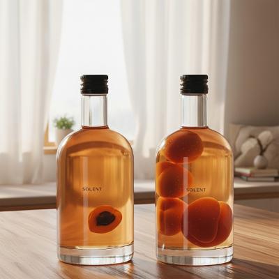 China Round Shape 500ml 750ml Liquor Glass Bottle With Screw Cap For Spirit Packaging for sale