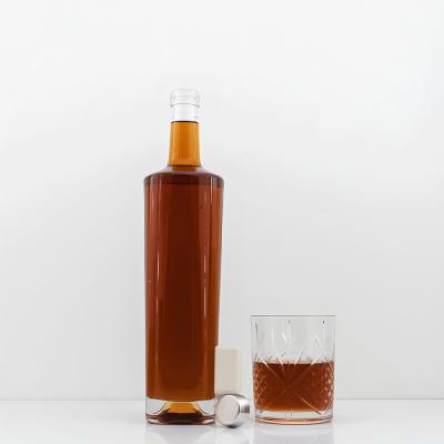 China Heavy Bottom 750ml Custom Glass Bottles Liquor Bottle With Flat Shoulder Design Spirits Packaging for sale