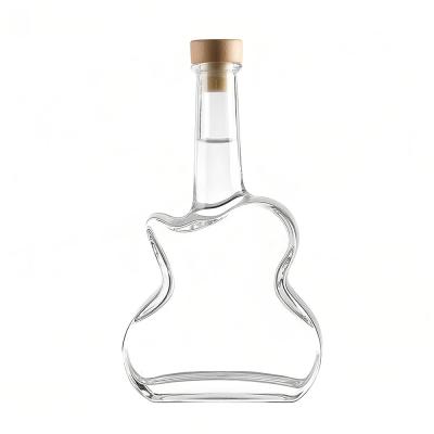 China Custom Guitar Shaped Luxury Crystal Glass Bottle With Wooden Cork For Vodka Whisky Rum Brandy Spirits for sale