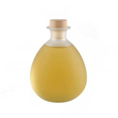 China Clear Frosted Water Drop Shape Glass Wine Bottle with Cork Seal for Juice Beverage Liquor Vodka for sale