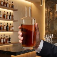 China 750ML Nordic Round Liquor Glass Bottle With Heavy Base Wooden Cork Stopper For Whiskey Vodka for sale