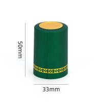 China Wine Liquor Bottle PVC Heat Shrink Capsules With Easy Tear Strip Embossed Logo for sale