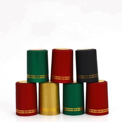 China Wine Liquor Bottle PVC Heat Shrink Capsules With Easy Tear Strip Embossed Logo for sale