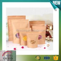 China Silvery Snack Packing Window Kraft Stand Up Zipper Pouch for Dried Fruit Packaging for sale