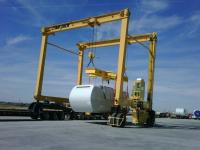 China Wind Turbine Section Lifted By Two Travelifts With I Beams Featuring Center Swivels for sale