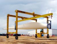 China Wind Turbine Section Lifted By Two Travelifts With I Beams Featuring Center Swivels for sale