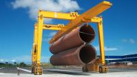 China Mobile Straddle Transporter To Lift And Store Wind Tower Sections With Spreader for sale