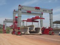 China Double Beam Cranes 130 Ton/Each Working In Tandem with Special Spreader To Handle for sale