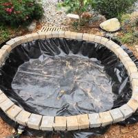China 1m-8m Width Green HDPE Geomembrane for Reinforced Anti-seepage Fish Pool Pond Liners for sale