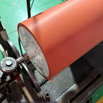 China Slotted Exhaust Carbon Fiber Rubber Roller Bopp Film Slitting Roller for sale