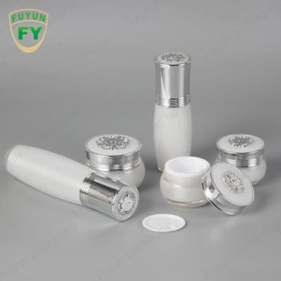 China Luxury Home Set Plastic Empty Bottle With Silver Cap 100ml 120ml for sale