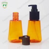 China 80ml 2.5oz Empty PET Plastic Hair Oil Bottles With Lotion Pump Orange for sale