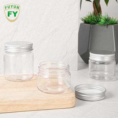 China 550ml 600ml 1000ml Cookie BPA Free PET Plastic Round Jar With Lid for sale