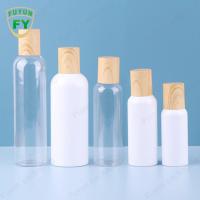 China Transparent PET 100ml Plastic Pump Bottles With Water Transfer Printing Wood Style for sale