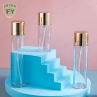 China Gold Cap Empty PET Spray Bottle 50ml Cylindrical Cosmetic Packaging for sale