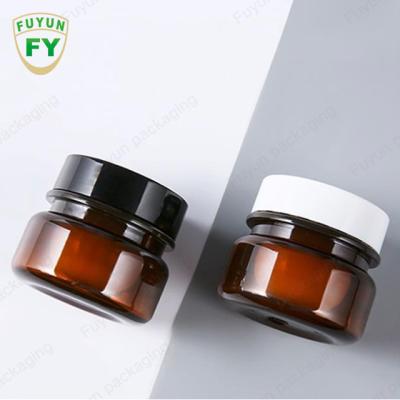 China Wholesale Cosmetic Food Packaging 30ml Amber Black Pet Plastic Cosmetic Cream Jar With White Black Lid for sale