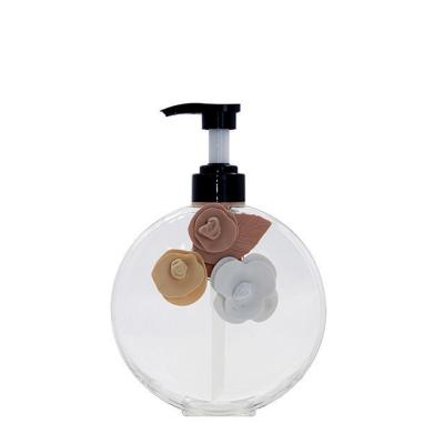 China Fuyun 300ml/500ml Plastic PETG flower decoration circle shape shampoo lotion pump bottle for sale