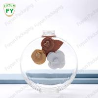 China Fuyun 300ml/500ml Plastic PETG flower decoration circle shape shampoo lotion pump bottle for sale