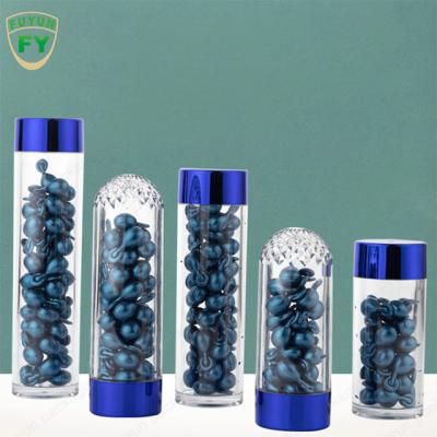 China 50ml 55ml 75ml PET Plastic Bottle With Shiny Purple Cap Capsule Container for sale